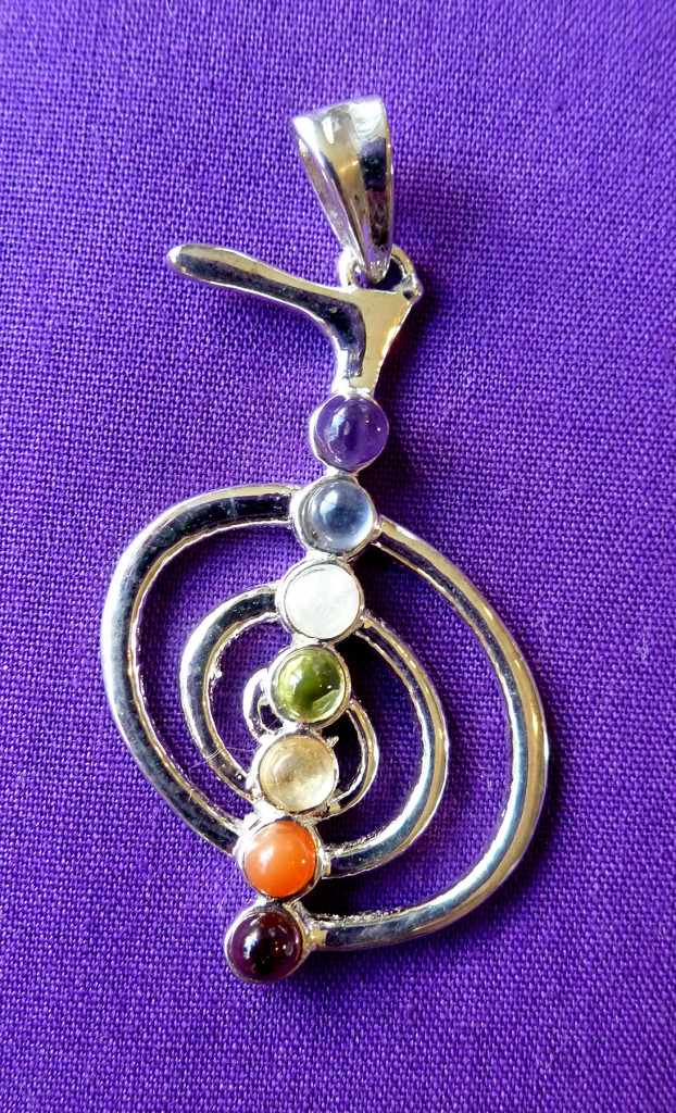 Reiki Cho Ku Rei chakra pendant.